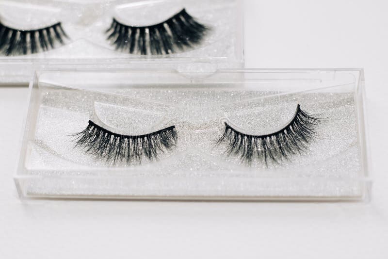 False Decorative Eyelashes on a White Background. Stock Image - Image ...