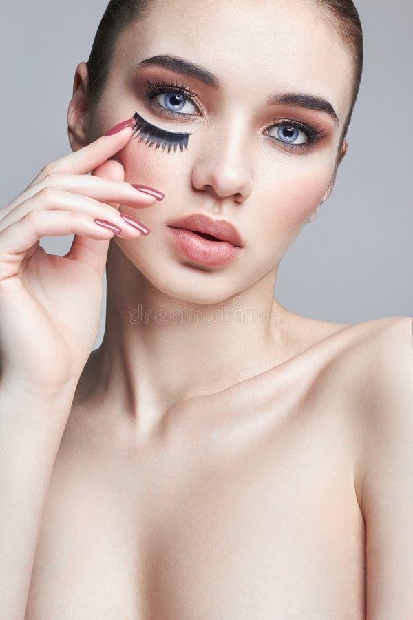 False Eyelashes on the Eyes. Increase in Volume of Eyelashes, Co Stock Image - Image of long ...