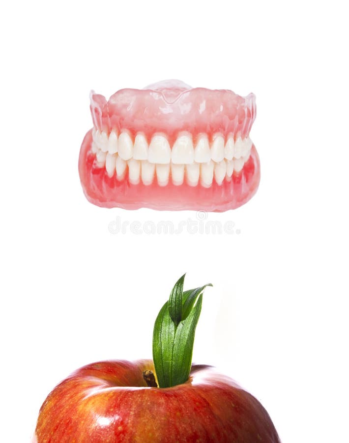 False or Fake Teeth with Red Fresh Apple - Healthy Teeth Concept Stock ...