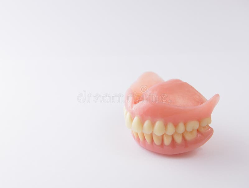 False Teeth on White Background Stock Image - Image of upper ...