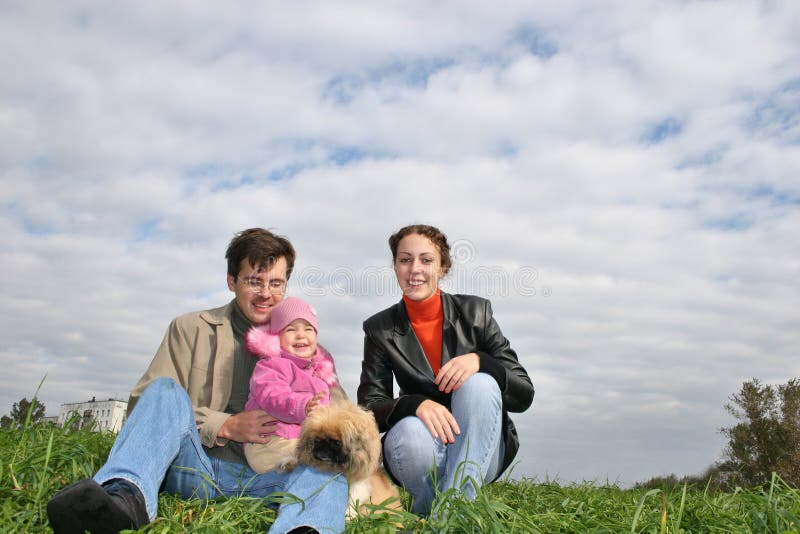 Family with baby and dog stock photo. Image of cloud, adult - 1431714