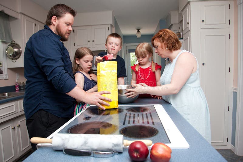 Family in Kitchen after Food Fight Stock Photo - Image of family ...