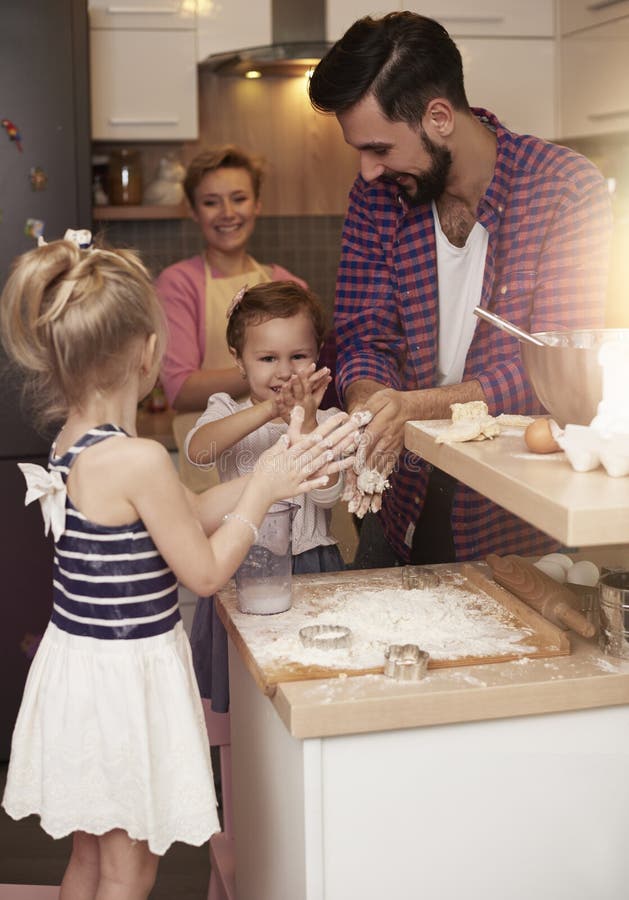 Family baking at home stock image. Image of ingredients - 84487411