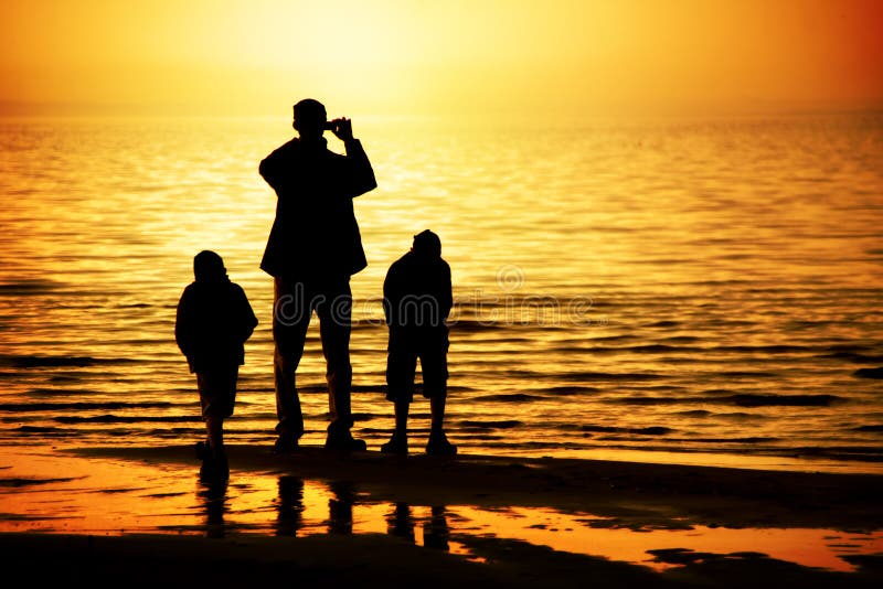 Backpackers on the beach stock image. Image of lights - 13149243