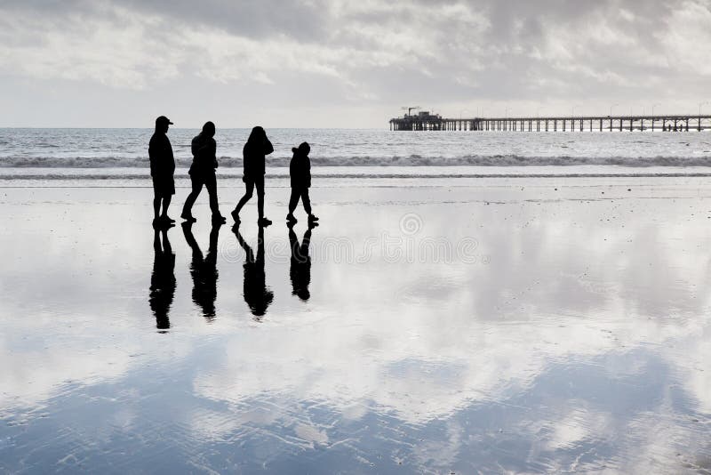 Family in a Beach Enjoying Their Quality Time. Stock Photo - Image of ...