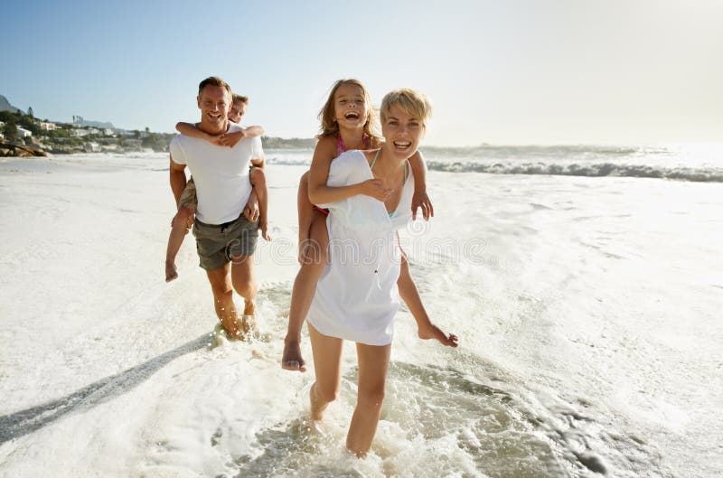 Family Beach Fun. a Family Having Fun at the Beach. Stock Image - Image ...