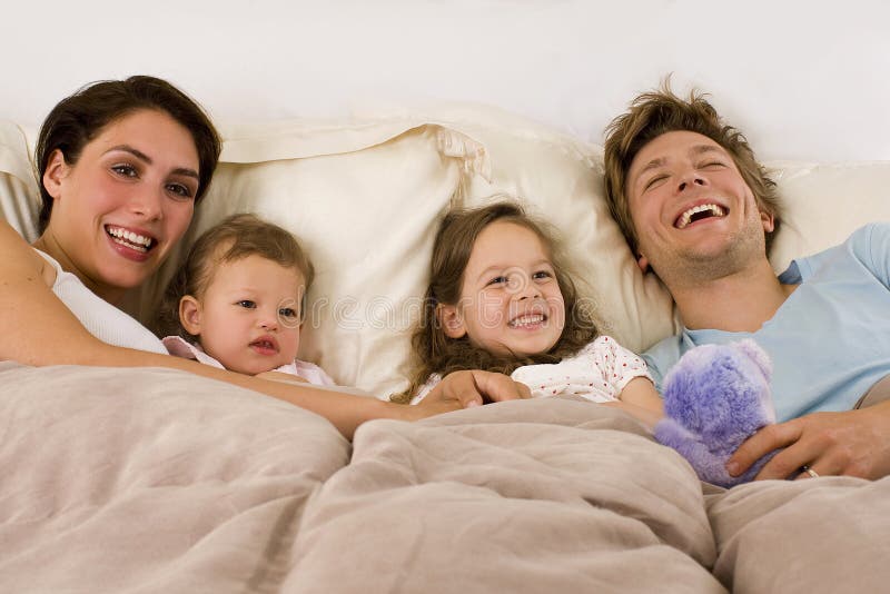 Family bed stock photo. Image of kids, people, morning - 10656776