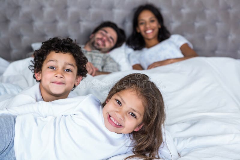 Family in bed stock photo. Image of home, child, children - 62325920