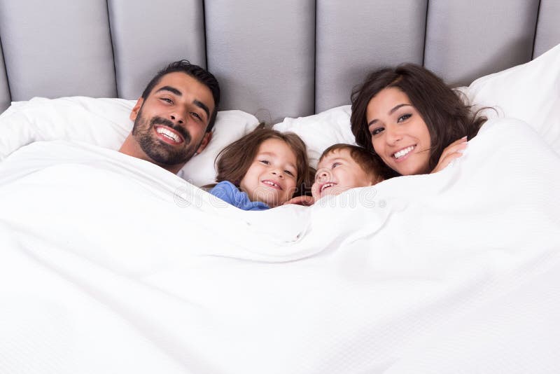 Family in bed stock image. Image of caucasian, mother - 47834403