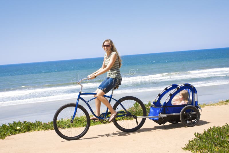 Family Bicycle Ride Along the Beach Stock Image - Image of bike ...