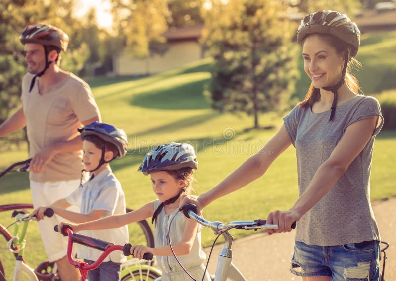 Family on bikes stock image. Image of cycling, leisure - 76580665