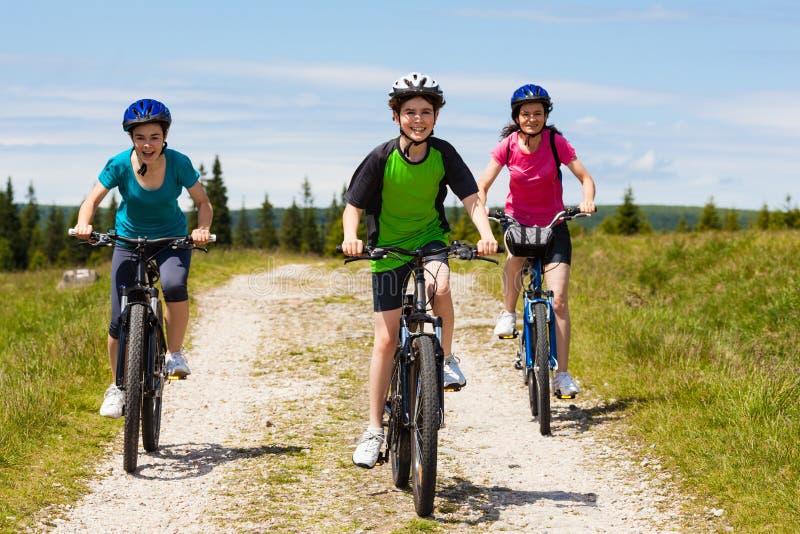 Family biking stock image. Image of bike, bikers, bikes - 28430069