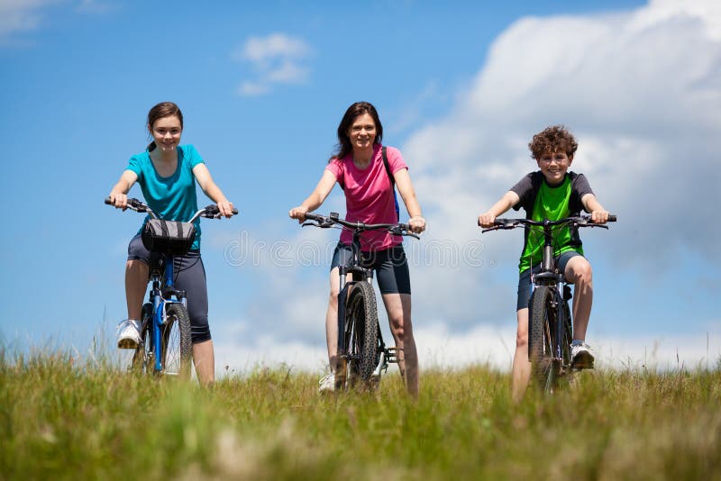 Family biking stock image. Image of activity, bikes, group - 28929635