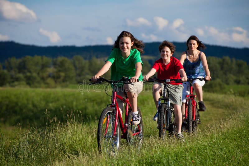 Family biking stock image. Image of cyclists, kids, biker - 58857805