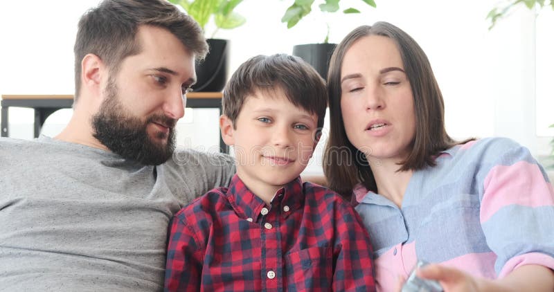 Bored Family Watching Tv at Home Stock Video - Video of home, sofa ...