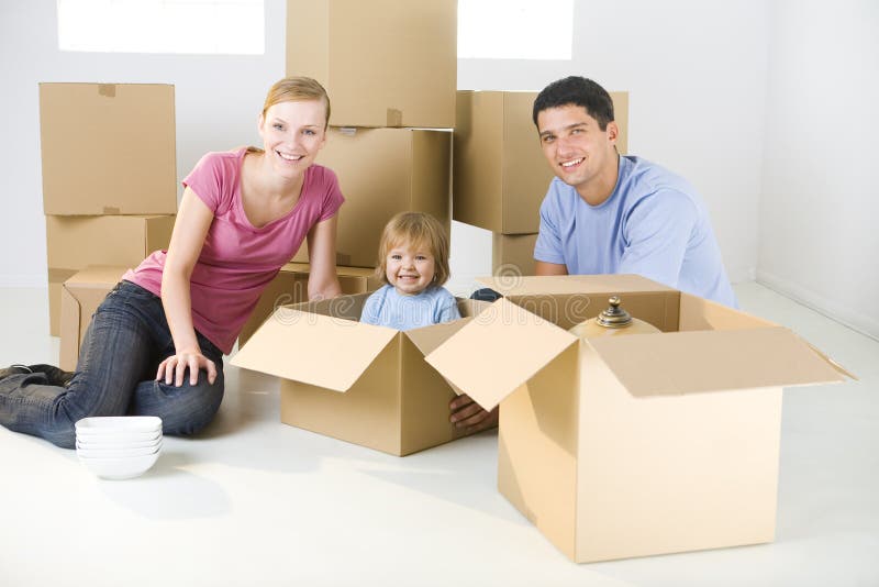 Happy New Homeowners - Family Moving Concept Stock Photo - Image of ...