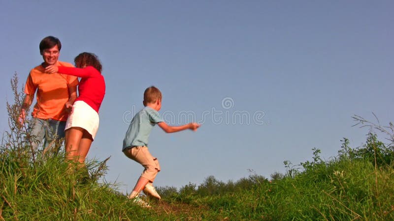 Family with Boy Play Tag on Stock Video - Video of adult, cute: 320479855