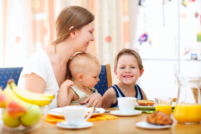 Family breakfast stock image. Image of enjoyment, daughter - 10980877