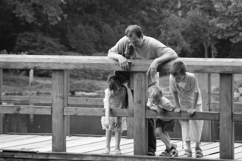 Family on bridge stock photo. Image of families, bridge - 1057706