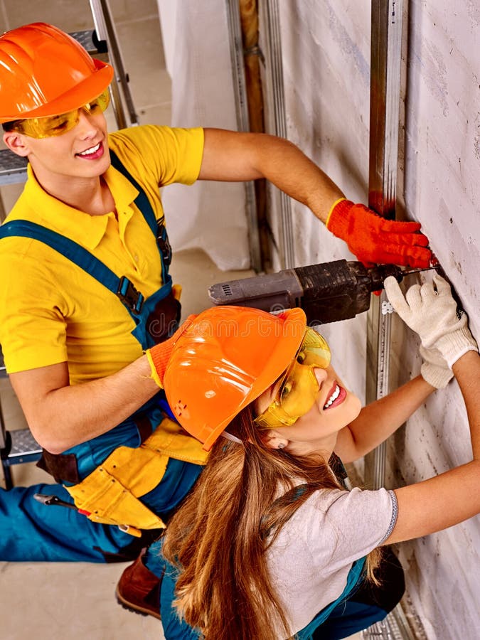 Family in Builder Uniform Indoor. Stock Photo - Image of equipment ...