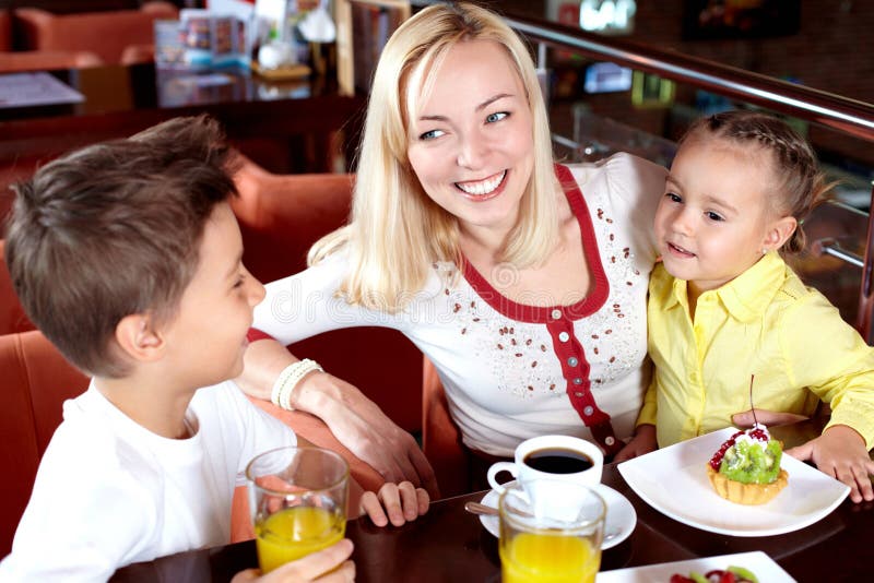 Family in cafe stock image. Image of drink, juice, happy - 21347703