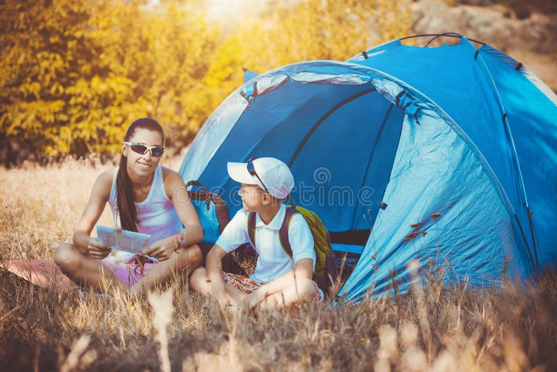 Family camping in the park stock photo. Image of leisure - 58740516