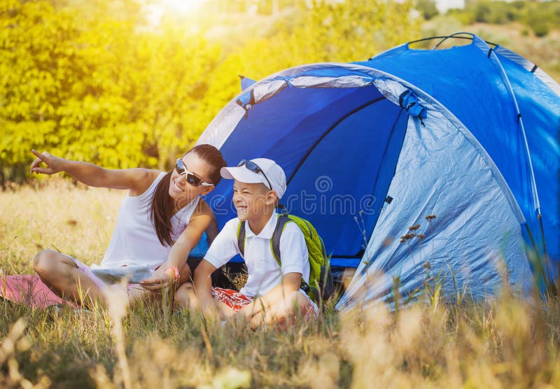 Family camping in the park stock photo. Image of leisure - 58740516
