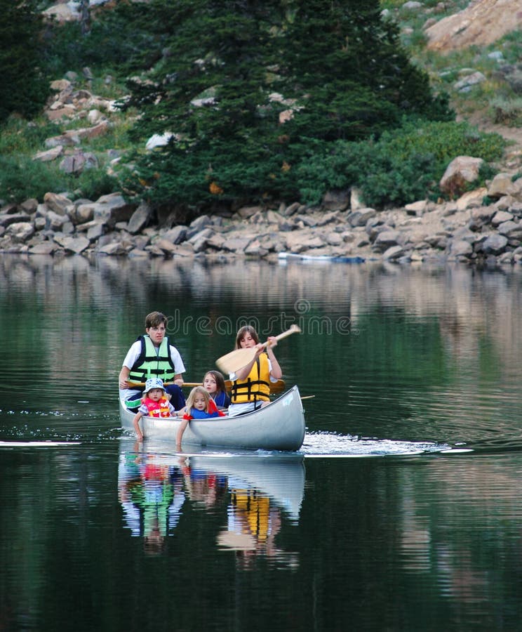 Family Canoeing at Lake stock photo. Image of bright, laugh - 8832654