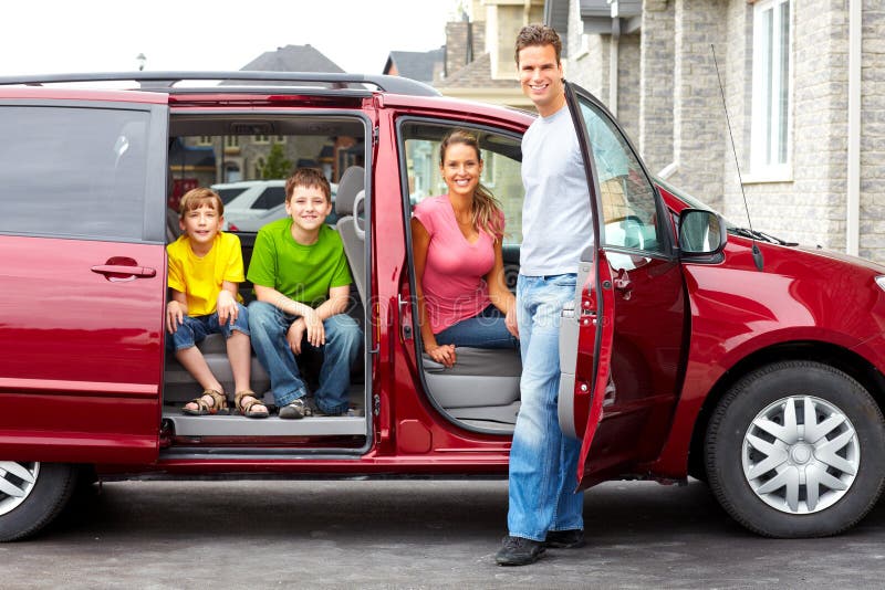 Young Family Pose Together at Rear of Car Stock Image - Image of ...