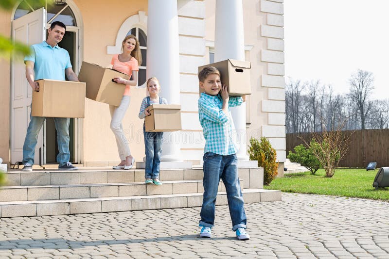 Family with Cardboard Boxes Moving Out from House Stock Image - Image ...