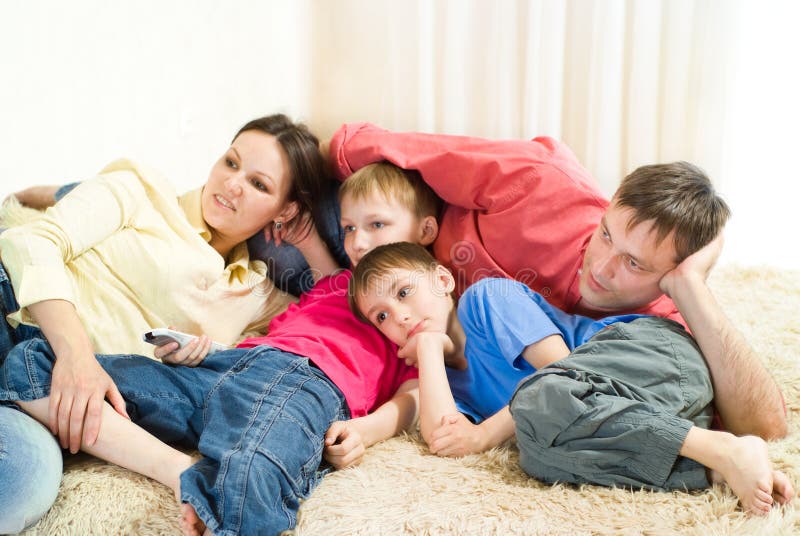 Family on the carpet stock image. Image of dreams, couple - 14512533