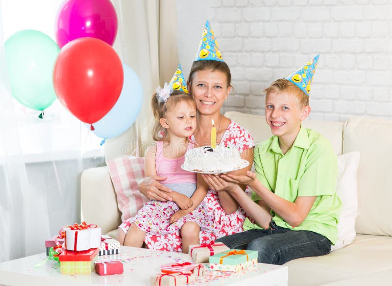 Family Celebrating a Birthday at Home Stock Photo - Image of family ...