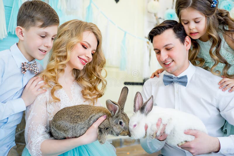 Family celebrating easter stock image. Image of costume - 121919143