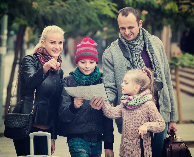 Family Checking Direction in Map Stock Image - Image of fall, person ...