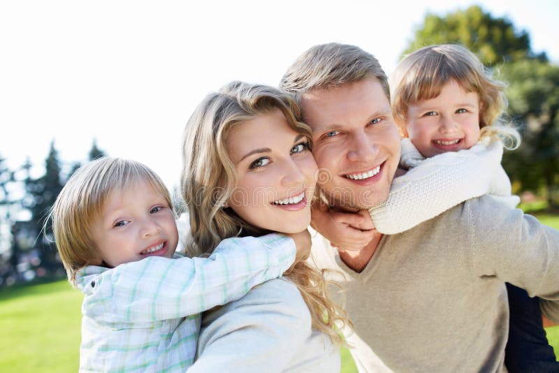 Happy family of four stock photo. Image of hugging, loving - 41938164