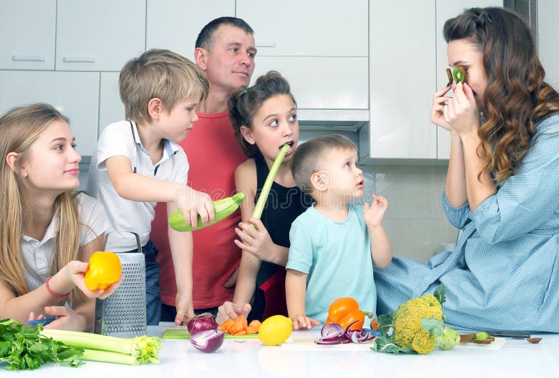 Family with Children Having Fun Over Cooking Stock Photo - Image of ...