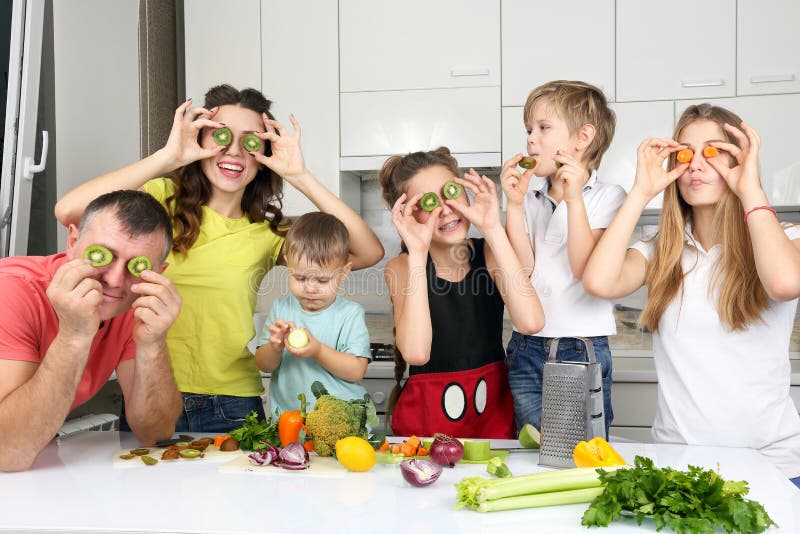 Family with Children Making Fun of Cooking Stock Image - Image of ...