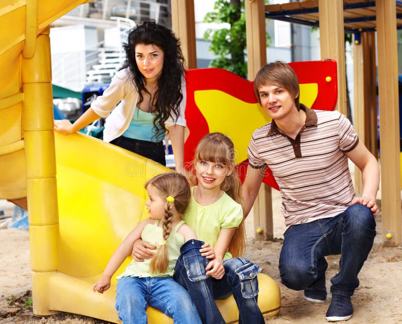 Family with Children on Slide Outdoor. Stock Photo - Image of girl ...