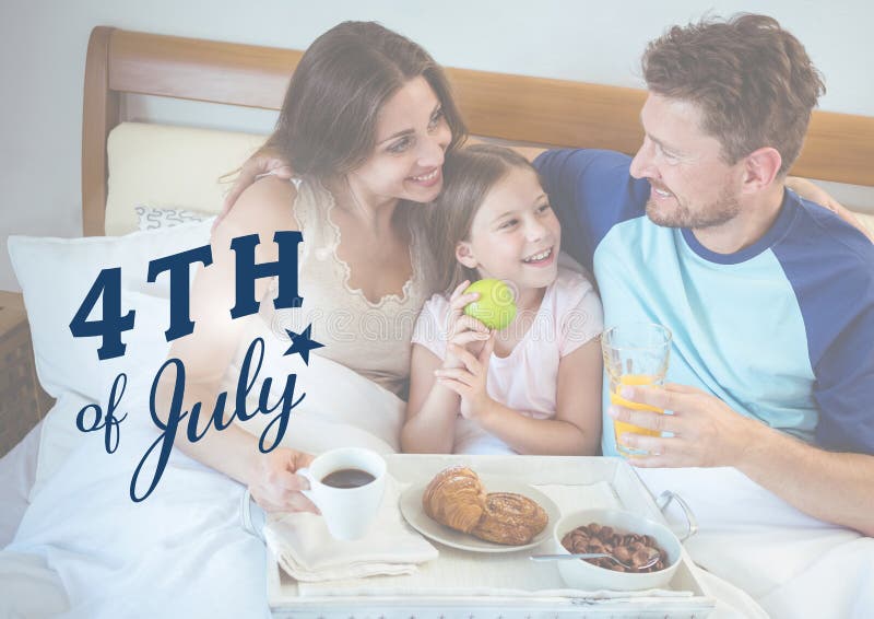 Family Chilling on the Bed for the 4th of July Stock Photo - Image of ...