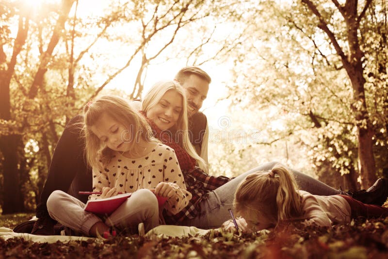 Family class in nature. stock image. Image of book, childhood - 120290559