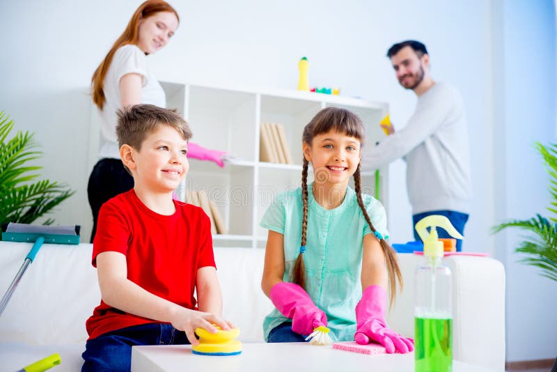 Family cleaning house stock image. Image of activity - 91554953