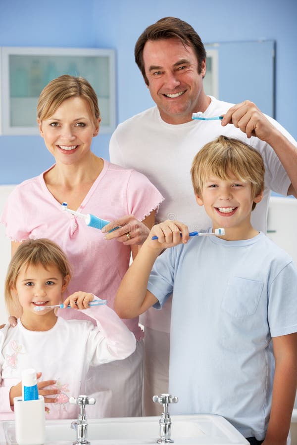 Family Cleaning Teeth Together in Bathroom Stock Photo - Image of basin ...