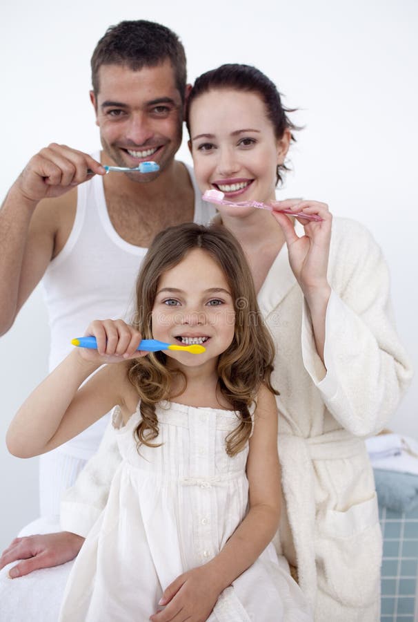 Family Cleaning Their Teeth in Bathroom Stock Photo - Image of girl ...