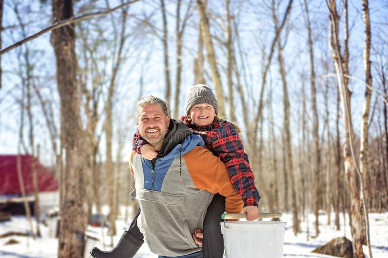 Family Close To a Maple Shack Having Fun Together Stock Image - Image ...