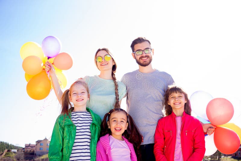Family with Colorful Balloons Stock Image - Image of celebrating ...