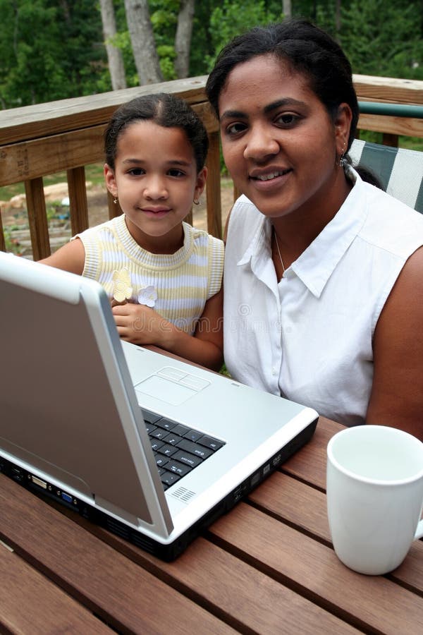 Family on Computer stock image. Image of african, coffee - 1013977