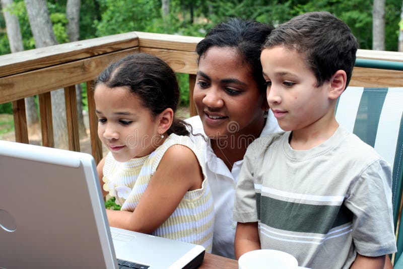 Family on Computer stock photo. Image of caucasian, mother - 1023654