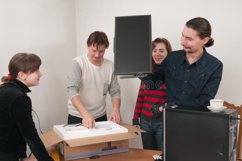 Family and the computer. stock photo. Image of monitor - 13157650
