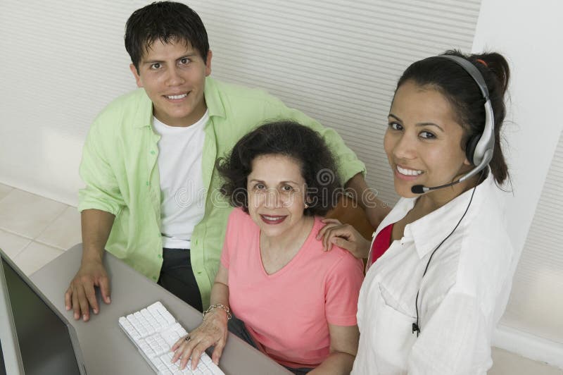 Family at Computer stock image. Image of cheerful, office - 13584393