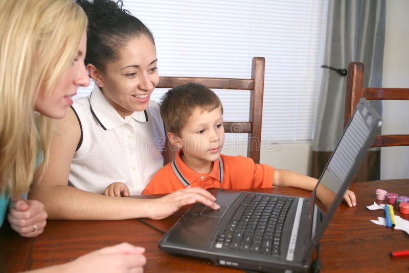 Family on Computer stock photo. Image of family, interracial - 1023652